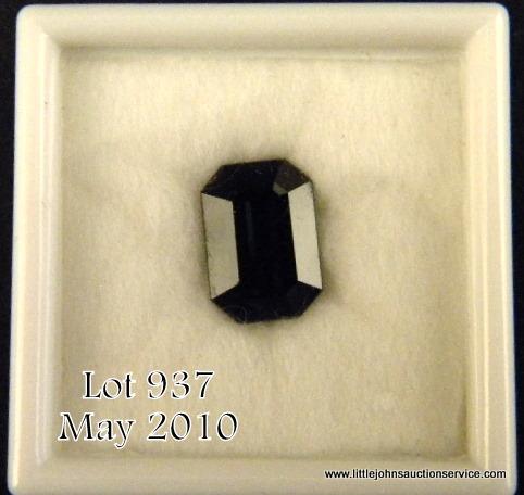 6.53 carat emerald cut dark blue sapphire. $300-$600.