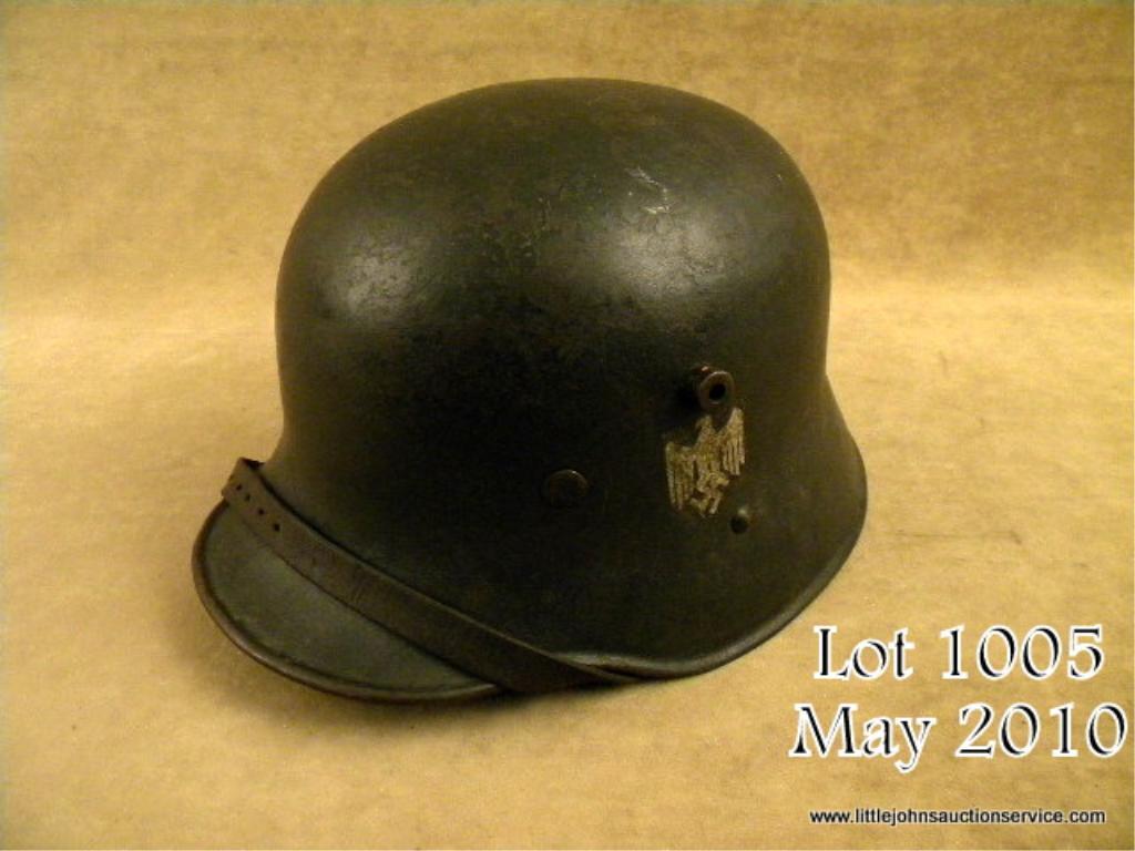 WWII German M16 Austrian model combat helmet. Retains approx. 90% of ...