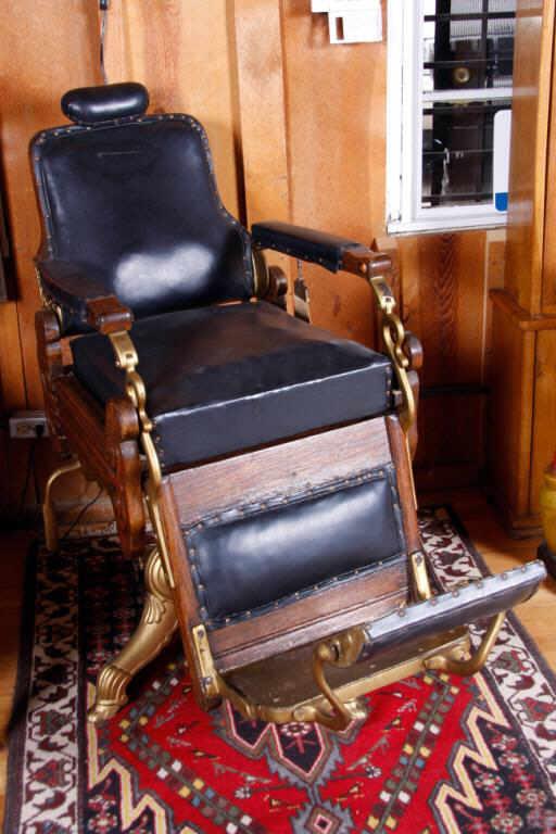 American Oak Koken Barber Chair with cast iron base and metal parts ...