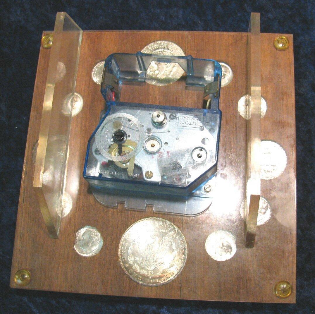 332. Silver Coin Clock. 1881S Morgan BU, (8) 1964 Dimes BU, (2) 1964 ...