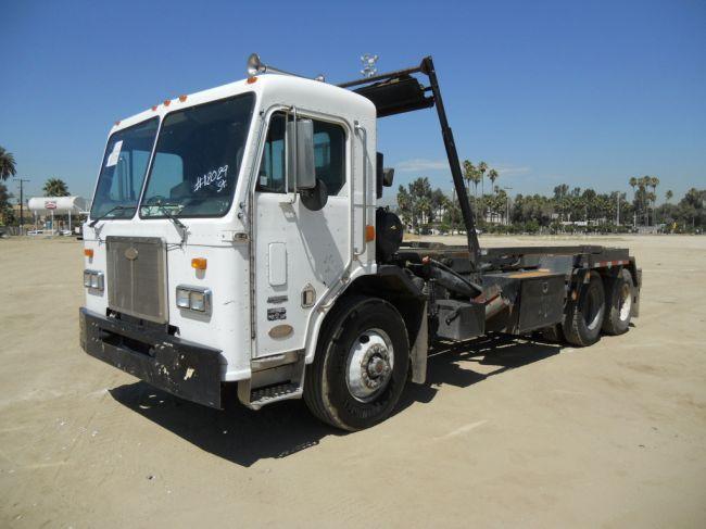 1996 Peterbilt 320 Cabover T/A Roll-Off Truck