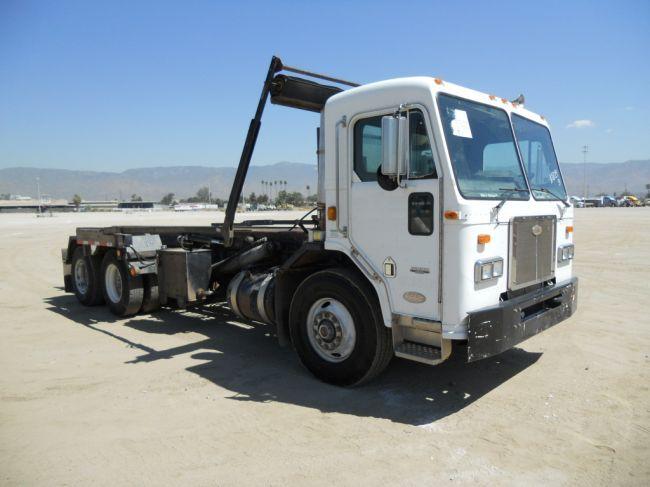1996 Peterbilt 320 Cabover T/A Roll-Off Truck
