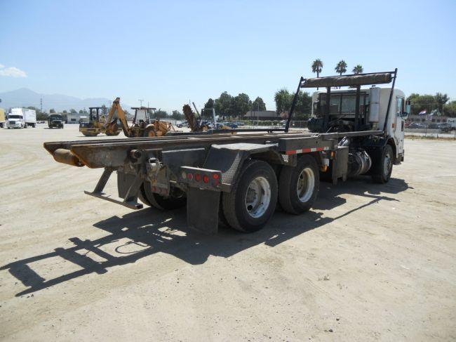 1996 Peterbilt 320 Cabover T/A Roll-Off Truck