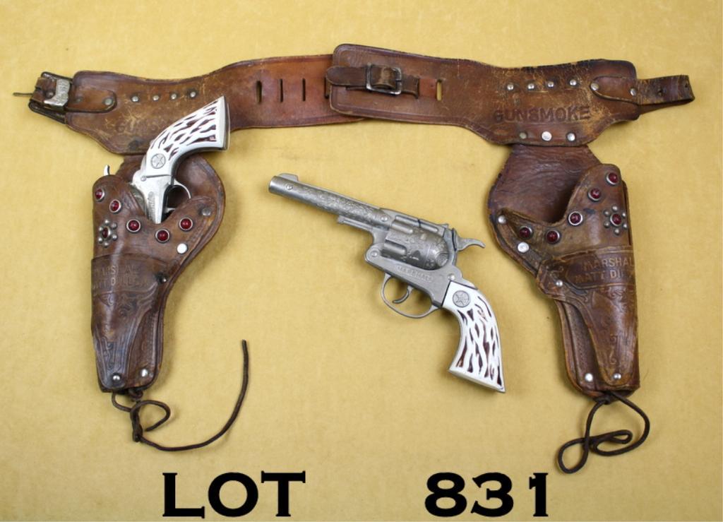 Great pair of metal cap guns with original leather belt and holsters ...