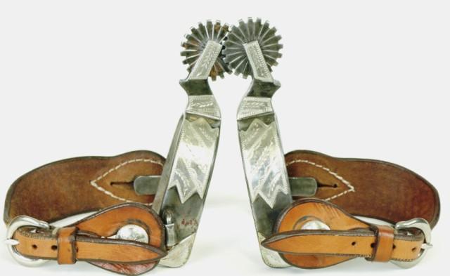 Pair of Emerson marked single mounted silver spurs