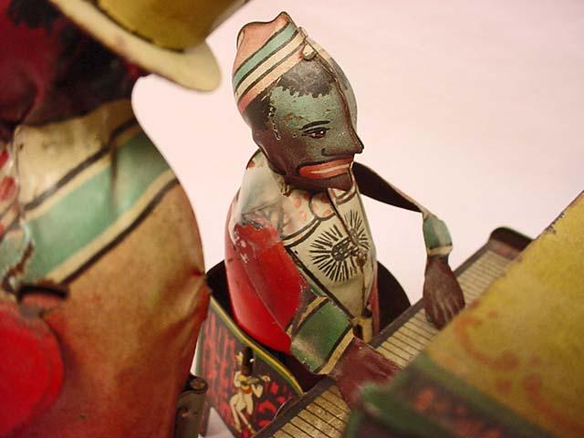 C. 1920'S BLACK AMERICANA STRAUSS HAM AND SAM TIN