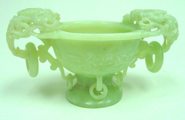 Chinese celadon jade sensor Mogul-style carving. Loss to scroll-work ...