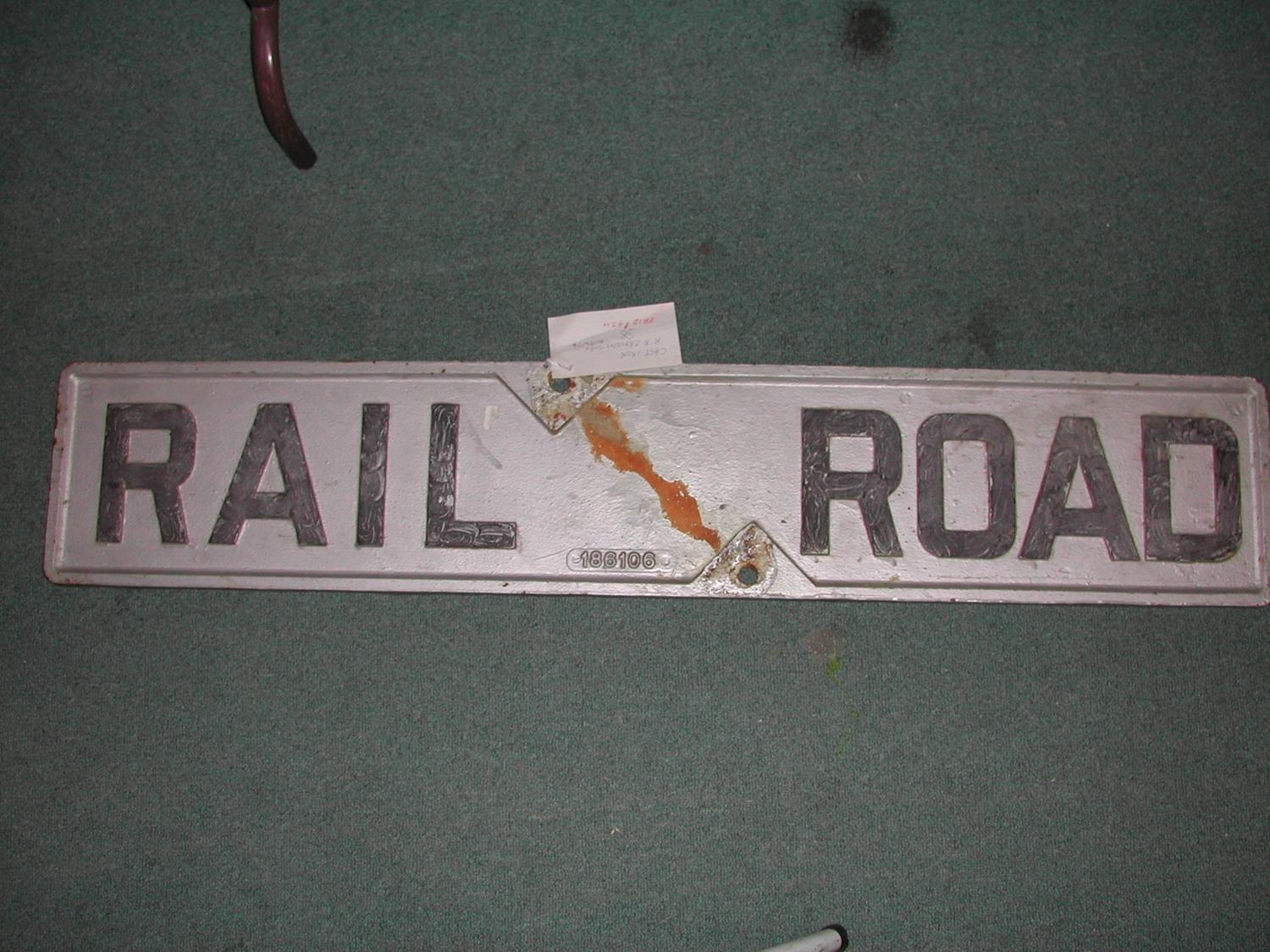 CAST IRON RAILROAD SIGN