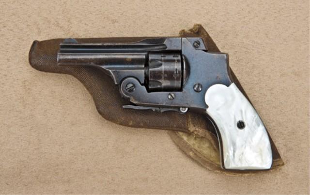 New “Baby” model 1911 double-action .22 caliber 6-shot revolver. Blued ...
