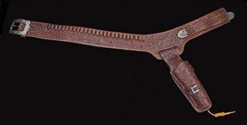 Finely carved and silver mounted western style gun rig by Edward Bohlin ...