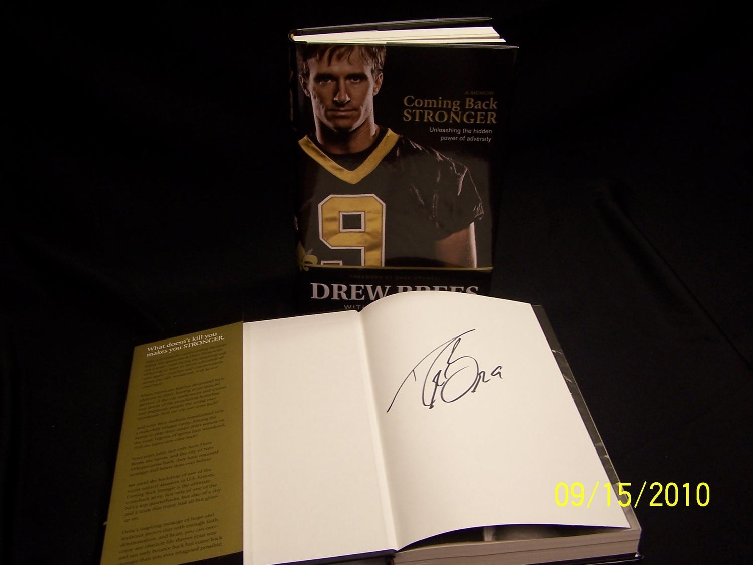 Autographed Drew Brees book and New Orleans Saints hat and XL long ...