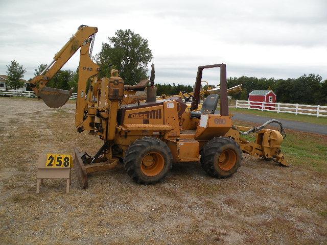 Case 660 cable plow w/D125 backhoe attachment