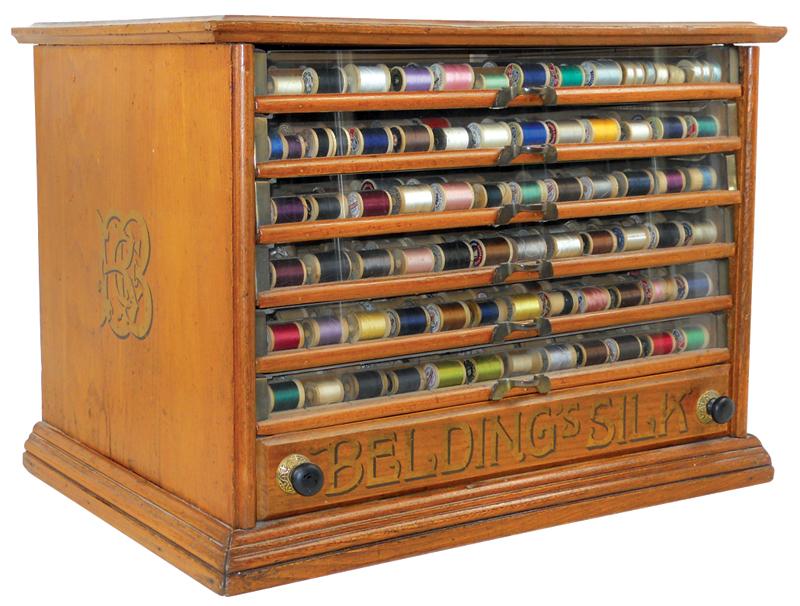 Thread cabinet, Belding's Silk, oak 7-drwr, 6 w/glass fronts, adv on ...