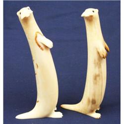 TWO ALASKAN WALRUS TUSK IVORY CARVED OTTERS