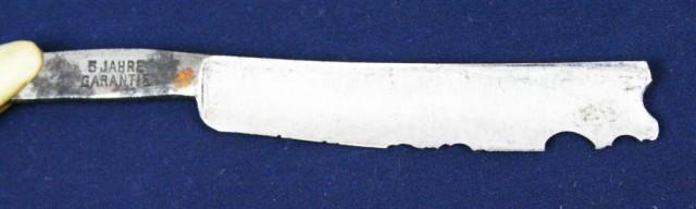 SCRIMSHAW BONE HANDLED STRAIGHT RAZOR