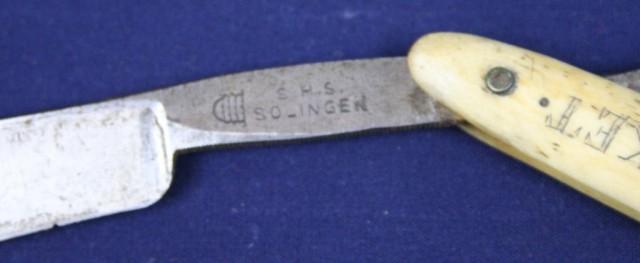 SCRIMSHAW BONE HANDLED STRAIGHT RAZOR
