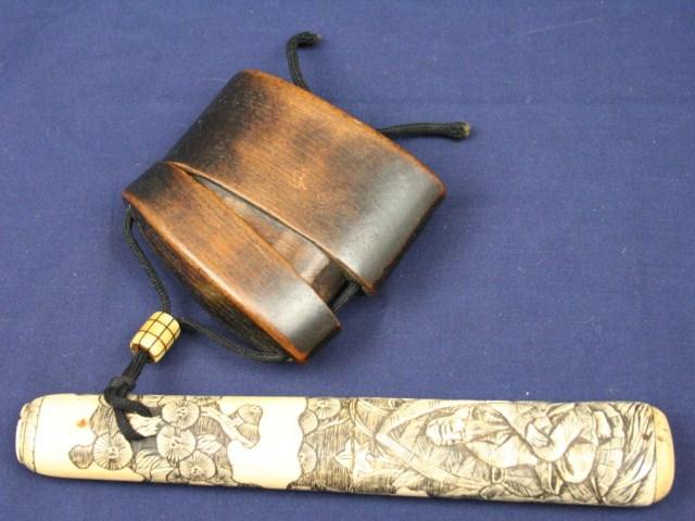 JAPANESE INRO WITH CARVED BONE PIPE HOLDER