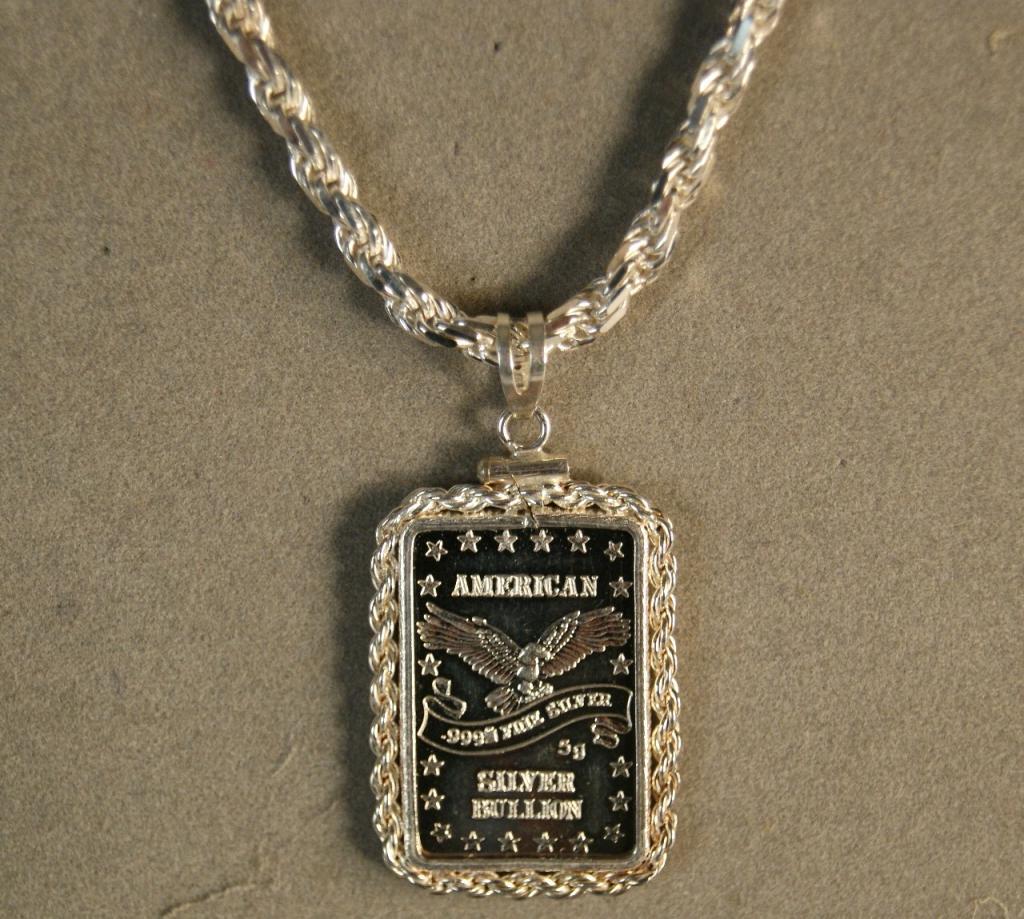 4 silver coin pendants 2 with.925 silver chains 1. 1900 Silver dollar ...