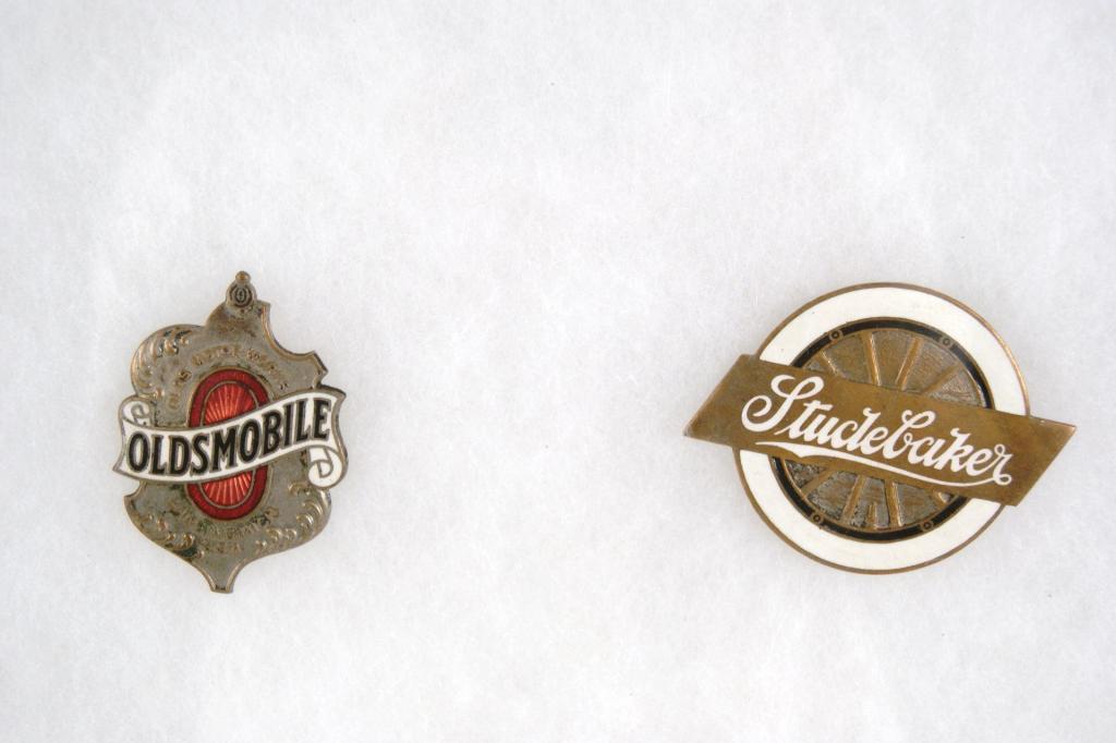 Collection of antique Automobile radiator emblems