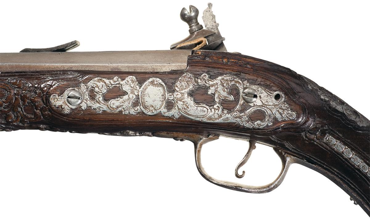 Italian Snaphaunce Flintlock Pistol with Engraving and Relief Carved Stock