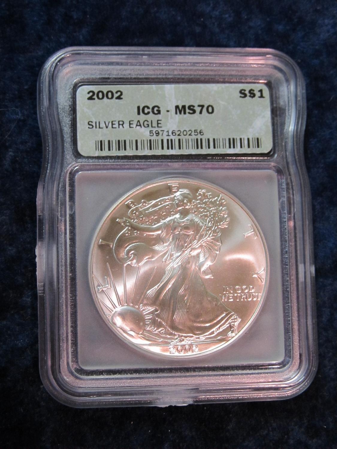 897. 2002 American Eagle Silver Dollar. ICG Slabed