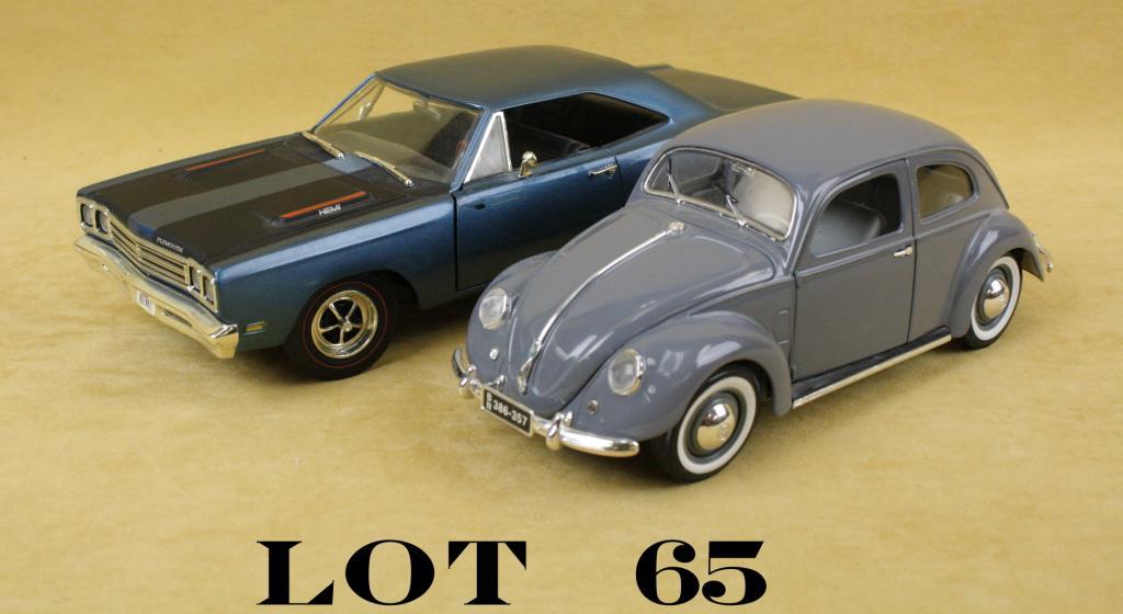 Lot of two collectible toy cars including a metal 1968 Plymouth Road ...