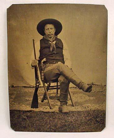 RARE OLD WEST TIN TYPE OF COWBOY HOLDING TRAPDOOR