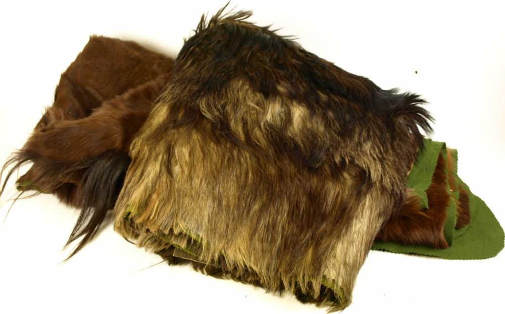 Collection of 2 early lap robes including one bear skin and the other ...