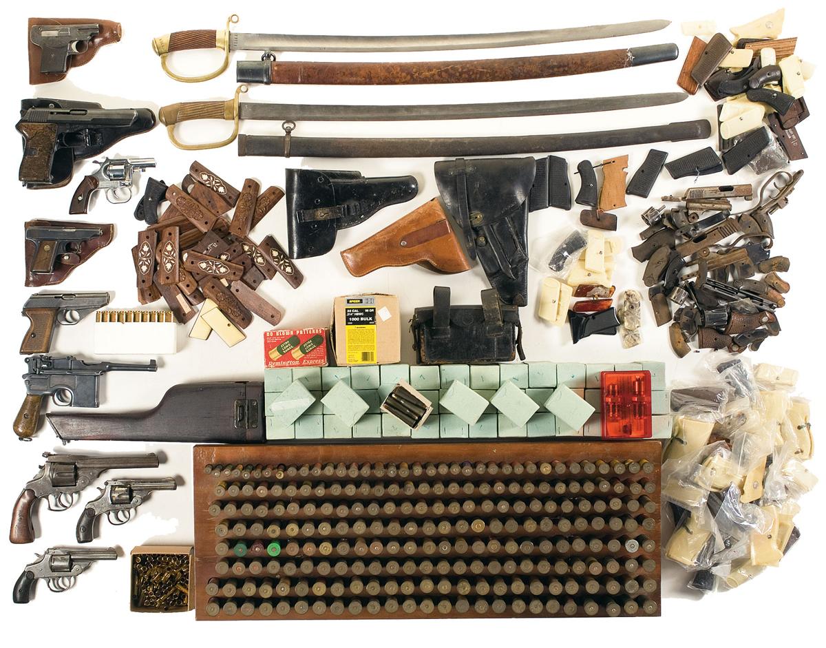 Nine Handguns, Two Swords and an Assortment of Gun Parts
