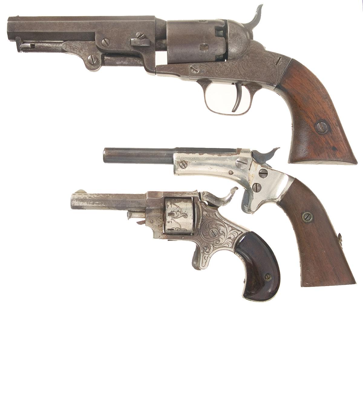 Two Revolvers and One Pistol