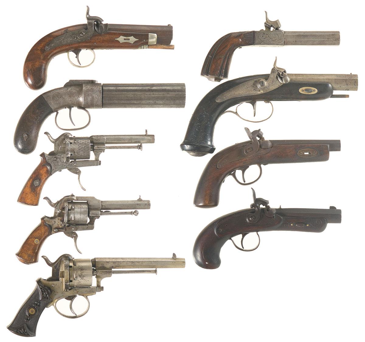 Nine Antique Handguns