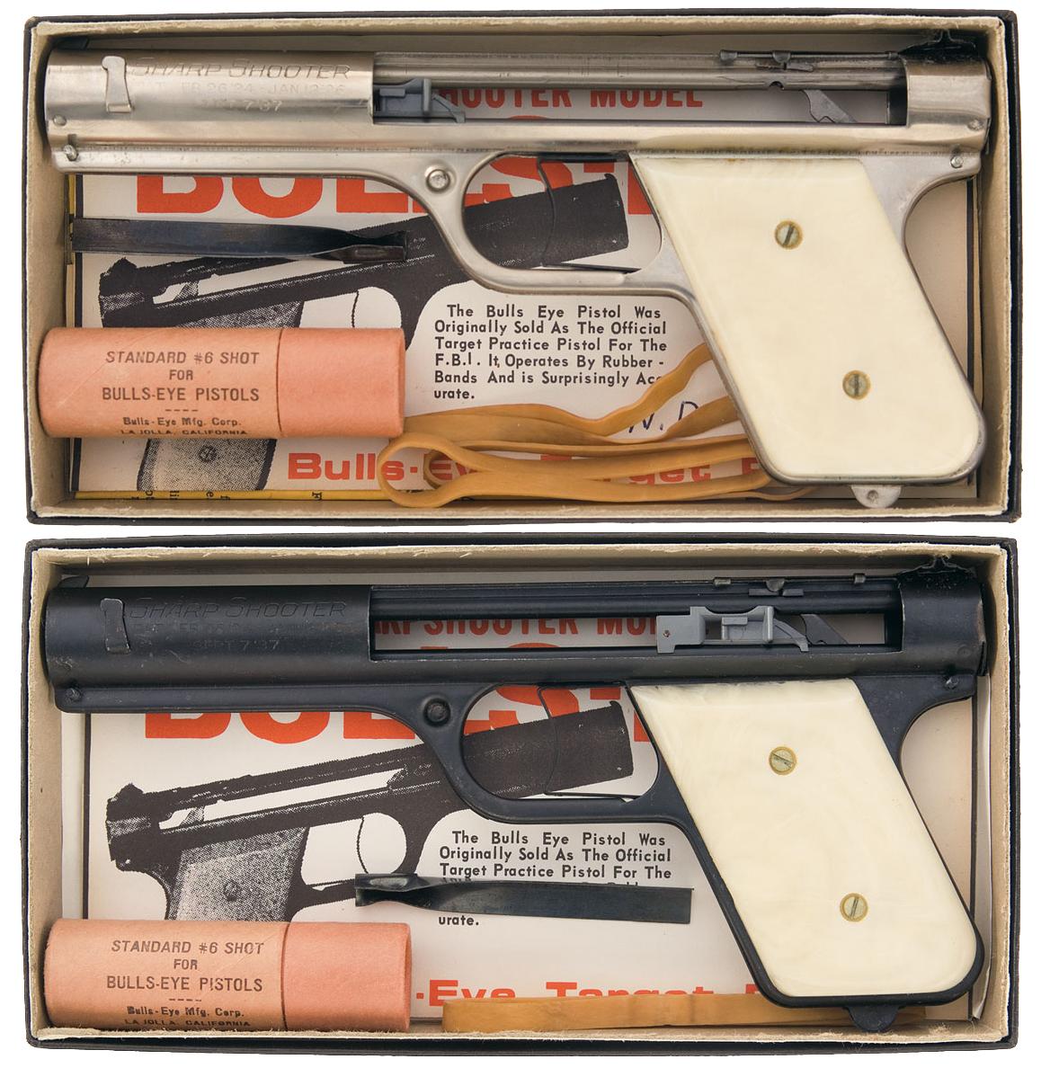 Two Boxed Bulls-Eye Sharpshooter Rubber Band Guns