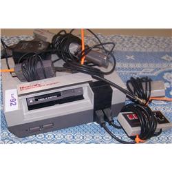 Original Nintendo game system w/ 2 controllers, gun, wheel of fortune ...