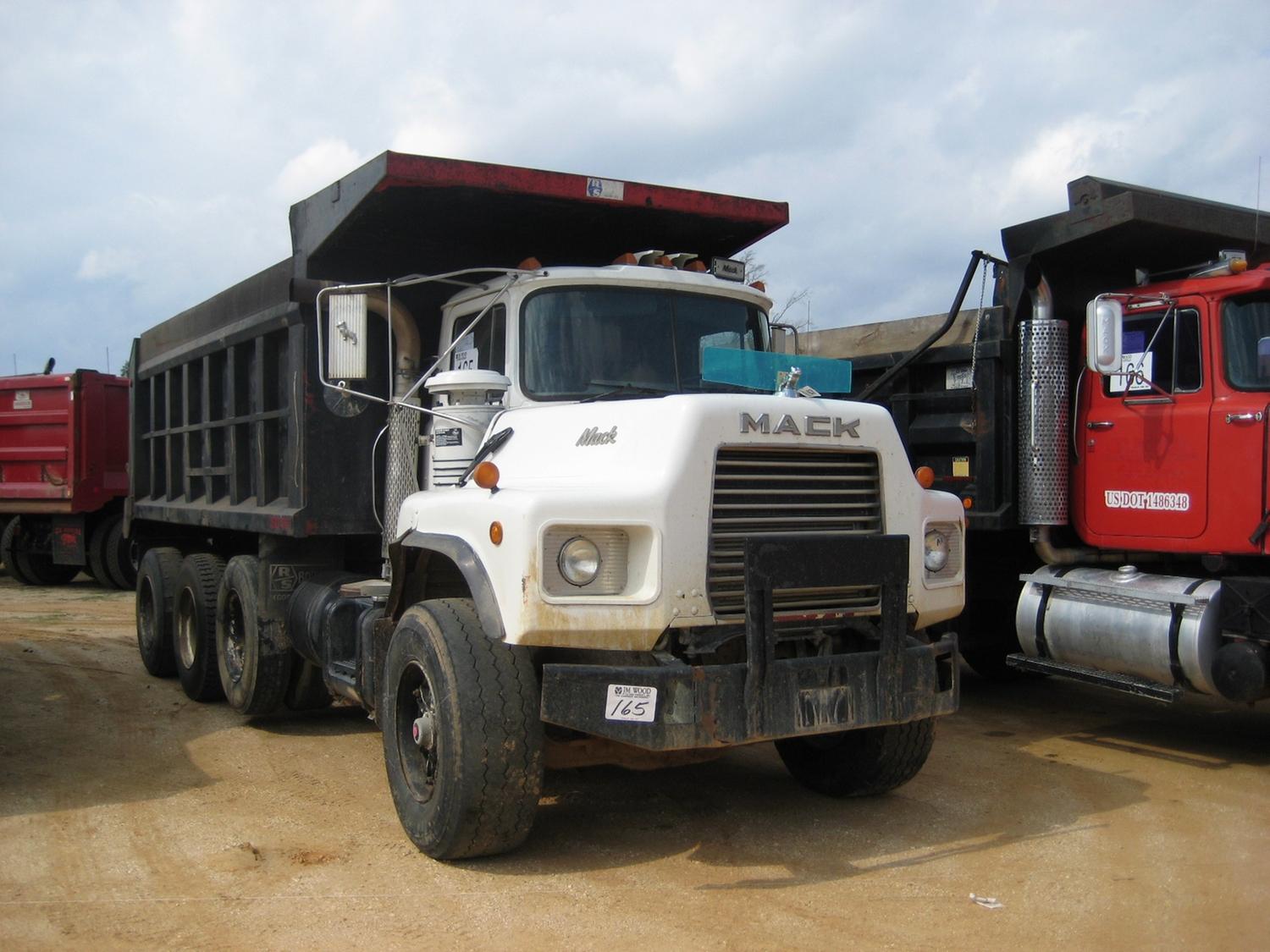 1993 MACK DM690S TRI-AXLE DUMP - J.M. Wood Auction Company, Inc.