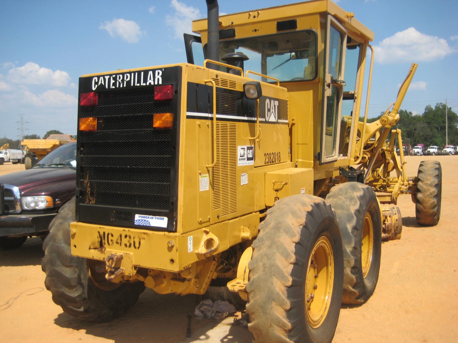 CAT 120H MOTOR GRADER - J.M. Wood Auction Company, Inc.