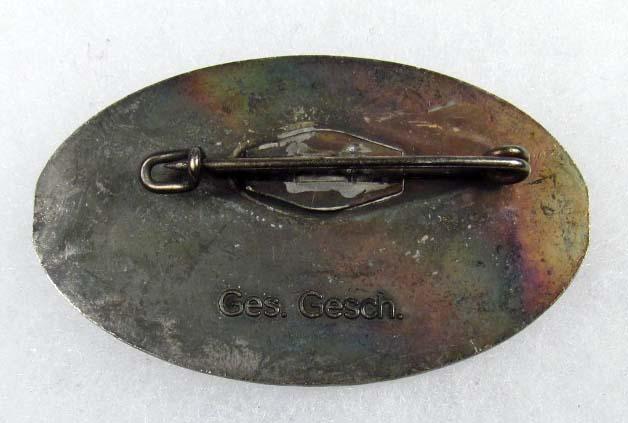 WW2 GERMAN NAZI SS ENAMELED BADGE - Front reads RE