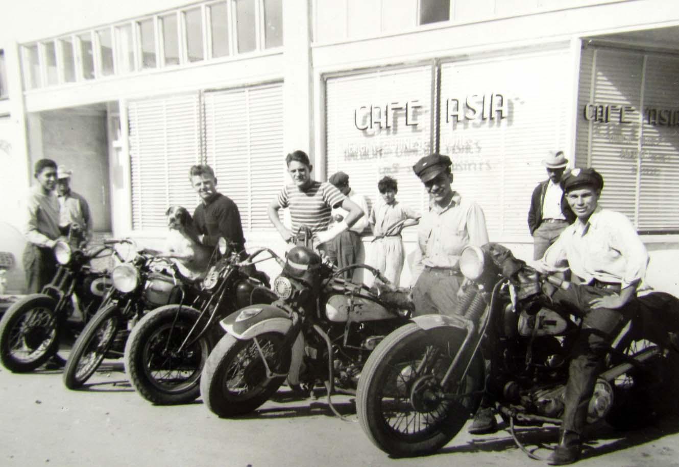 C. 1950'S RPPC REAL PHOTO POSTCARD OF MOTORCYCLES IN FRONT OF CAFE