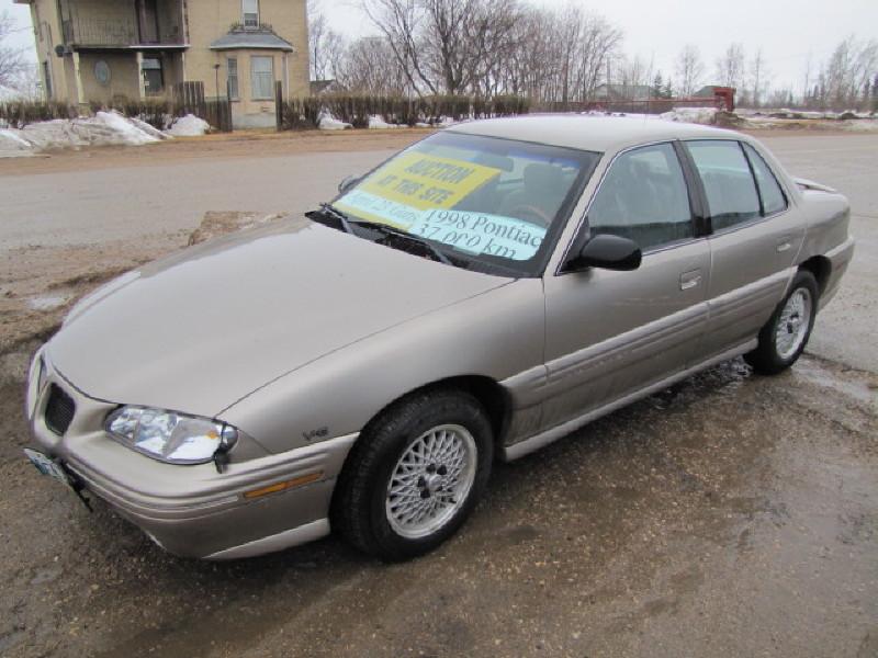 1998 Pontiac Grand Am SE, 4 Door, 6Cyl, Brown, 37,0000 km - Yes the kms ...