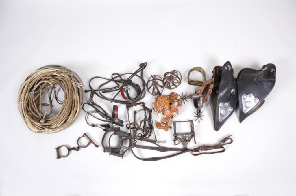 Western Extravaganza Lot Includes several rawhide larriots, a pair of ...