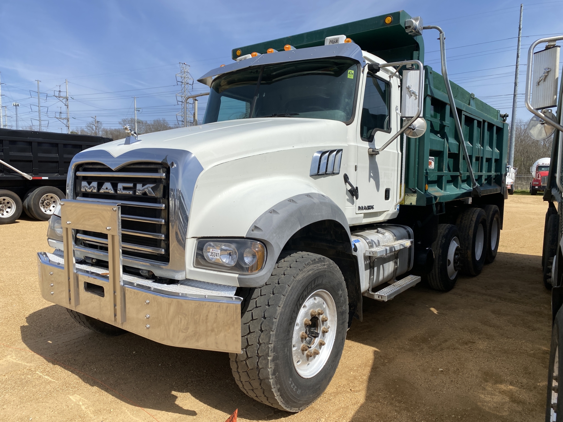 2016 MACK GU713 Dump Truck - J.M. Wood Auction Company, Inc.