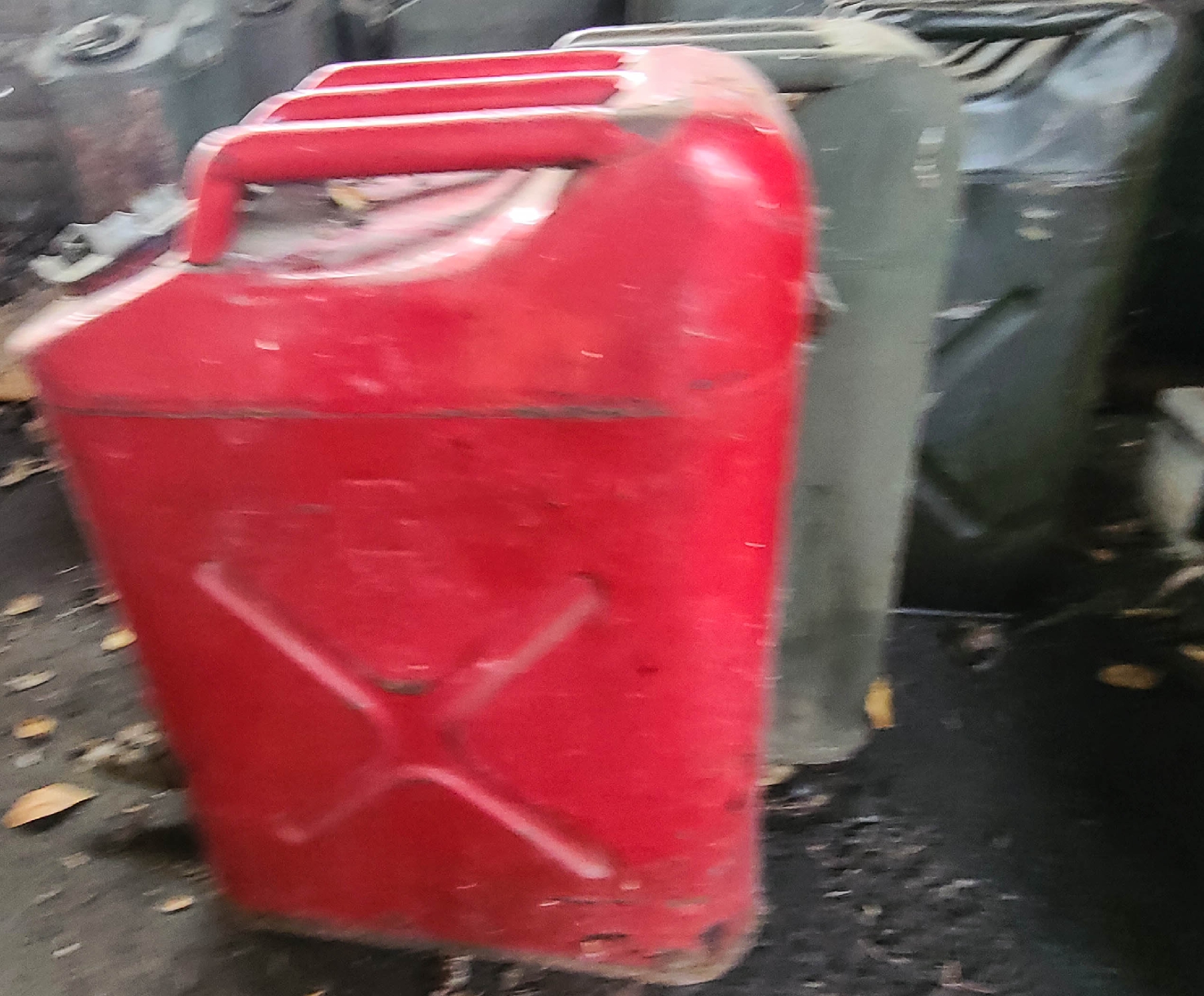THREE 5 GALLON MILITARY FUEL CANS - ONE RED