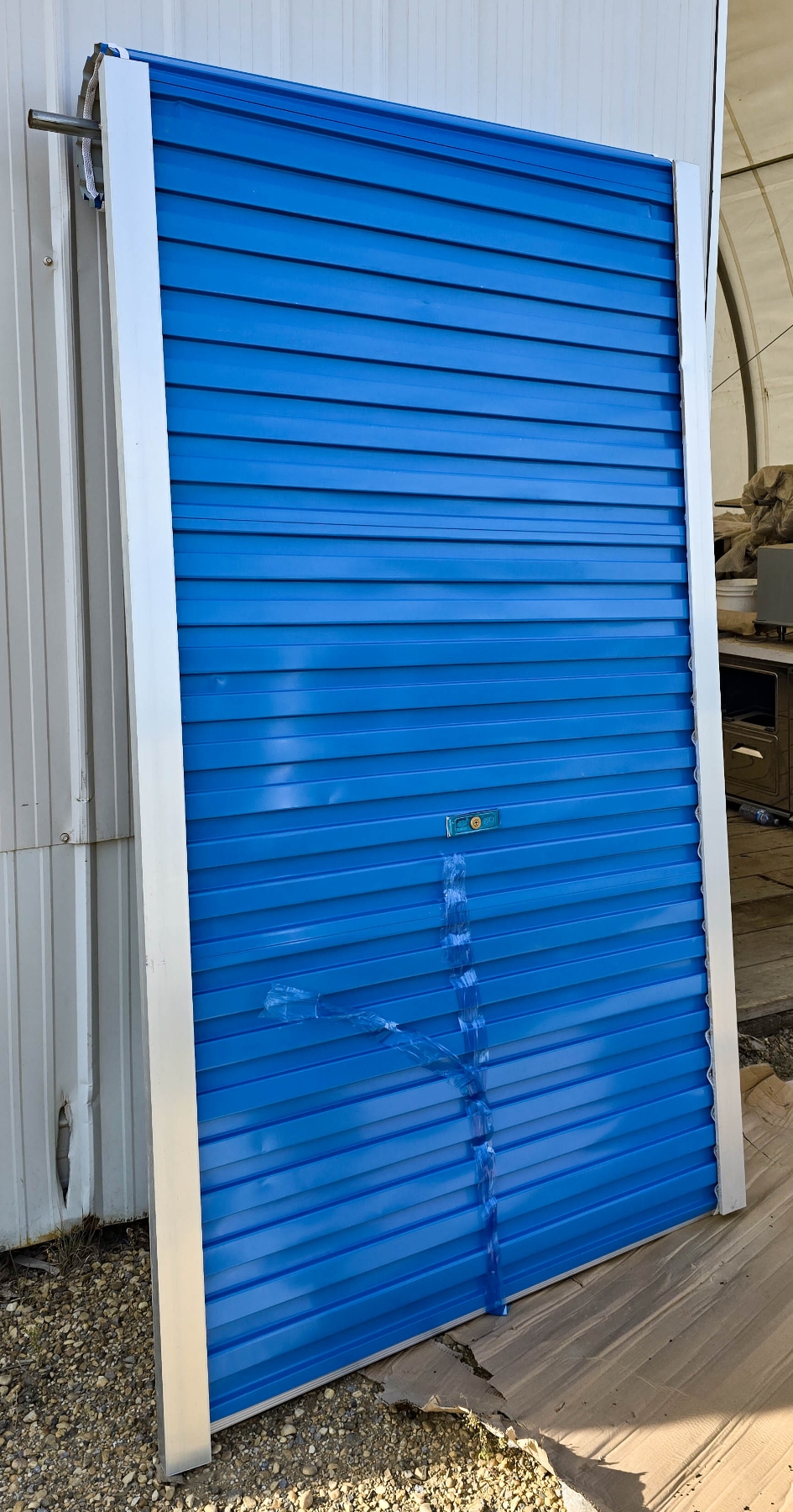 ROLLING STORAGE UNIT STYLE DOOR