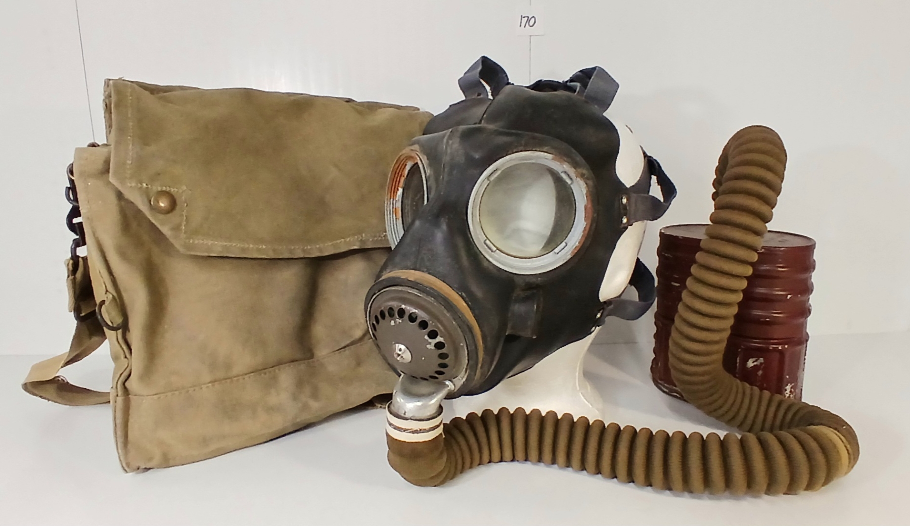 WWII BRITISH LONG TUBE GAS MASK W/ BAG - Kidd Family Auctions