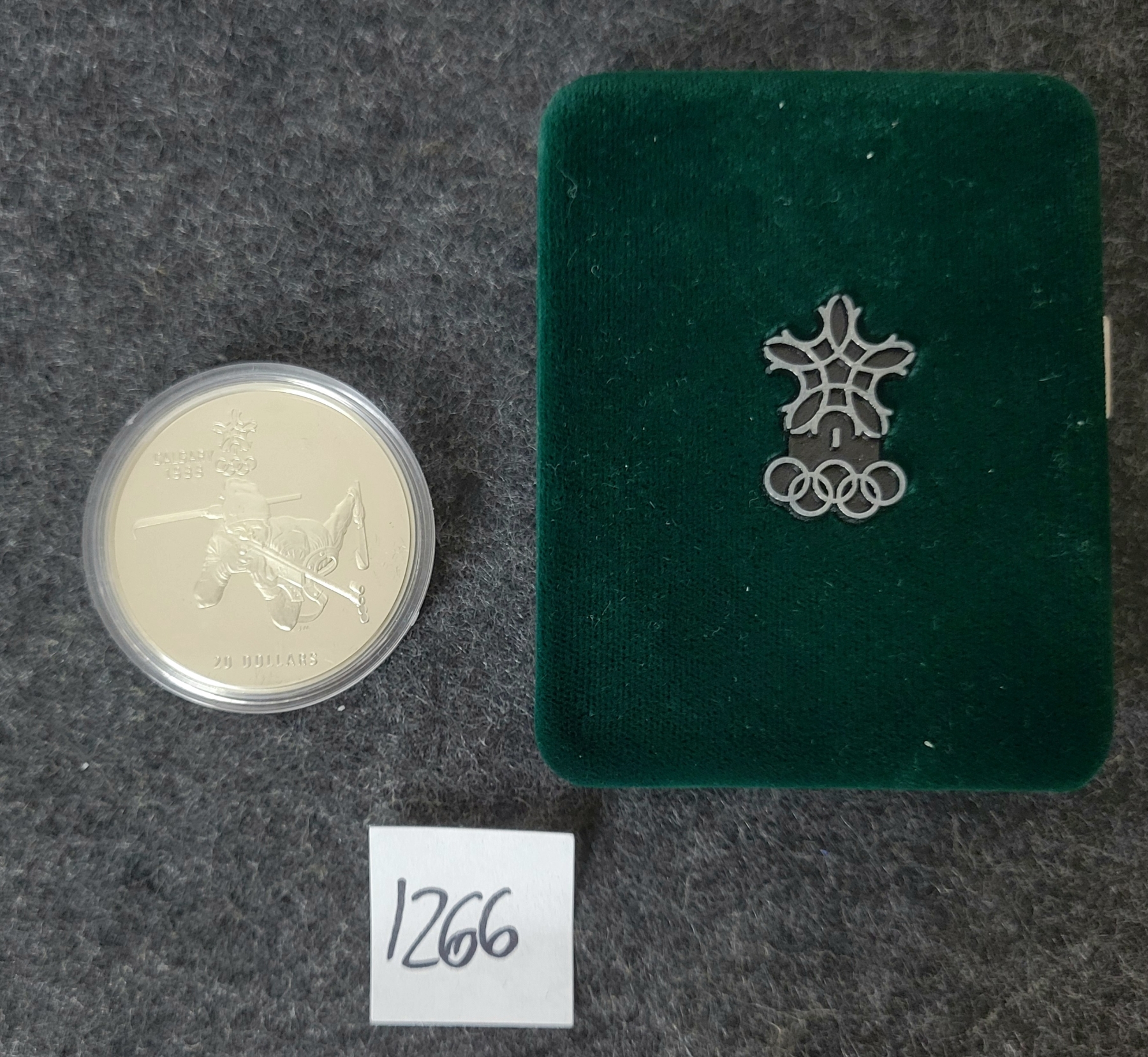1988 RCM $20 SILVER COIN - CALGARY WINTER OLYMPICS - Kidd Family Auctions