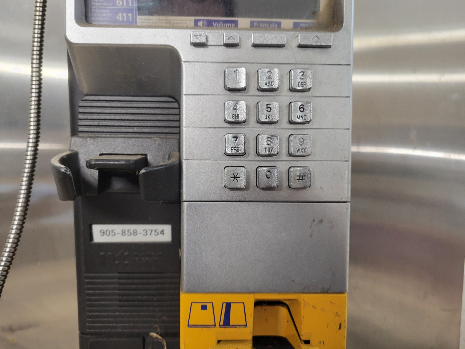 BELL/NORTHERN TELECOM PAYPHONE, MOUNTED ON STAINLESS STEEL PANEL