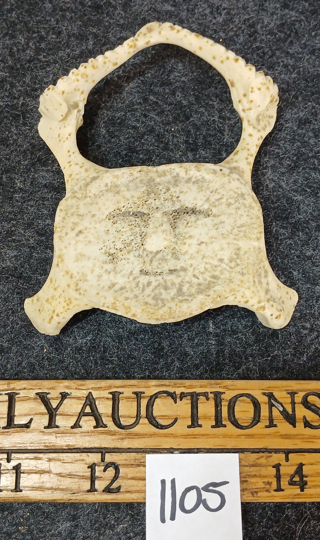 1987 "TWO FACES" BY ELIJAH TASSUGAT - BONE - Kidd Family Auctions