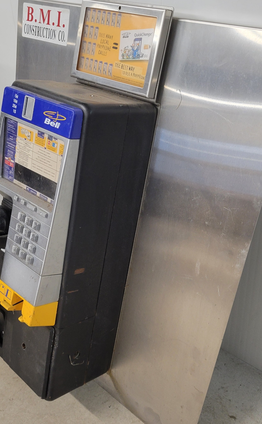 BELL/NORTHERN TELECOM PAYPHONE, MOUNTED ON STAINLESS STEEL PANEL