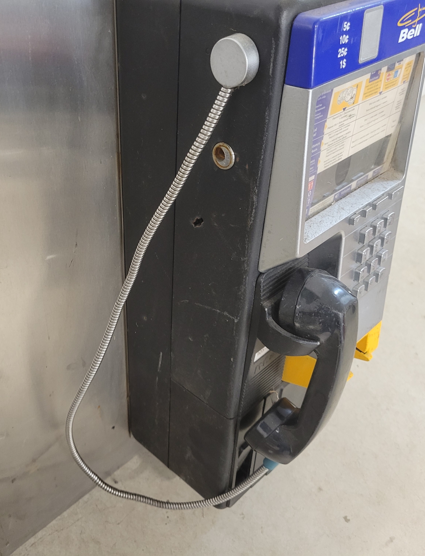 BELL/NORTHERN TELECOM PAYPHONE, MOUNTED ON STAINLESS STEEL PANEL