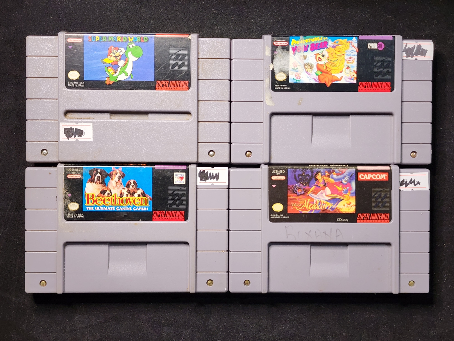 Four Assorted Super Nintendo Video Games Ft. Super Mario World, Yogi ...