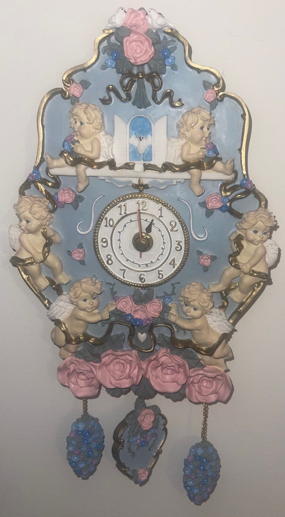 Light Blue Clock, 12 L - Beck Auctions Inc.